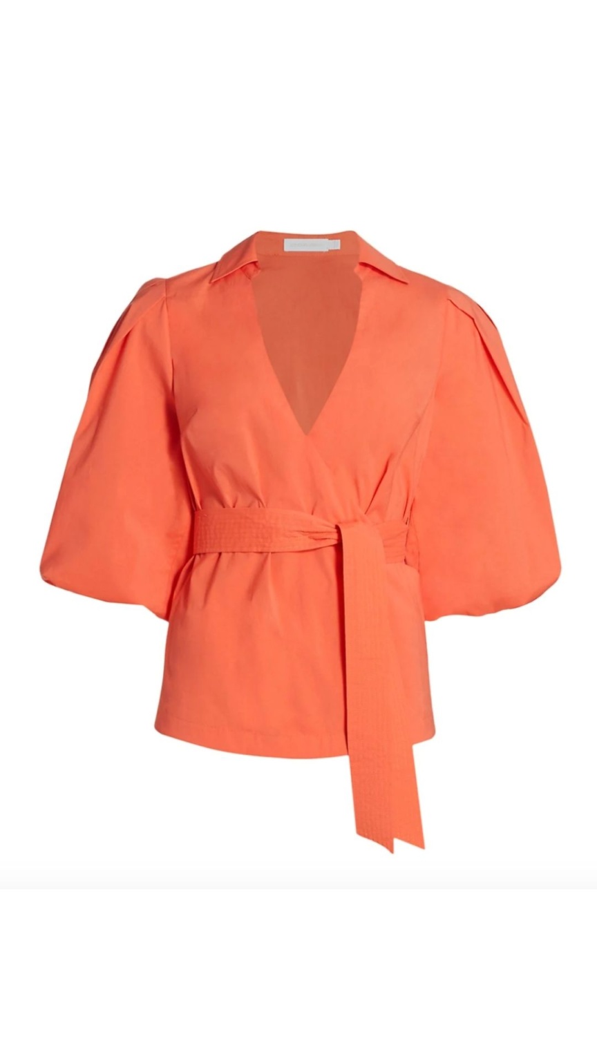 Robyn Dixon's Orange Puff Sleeve Wrap Top