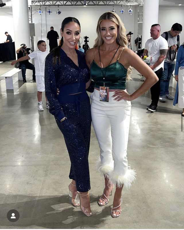 Danielle Cabral's Green Chain Strap Top